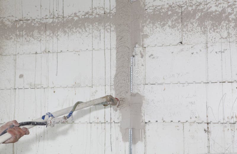 Builder Hold in Hands Automatic Cement Wall Screeding Plaster Machine ...