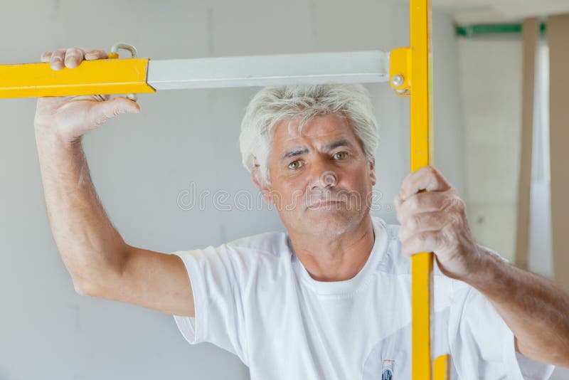 Builder Holding Metal Frame Stock Photo - Image of frame, framework ...