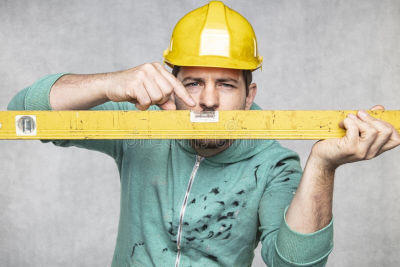 The Builder Holds in His Hands the Spirit Levels, the Idea of Accuracy ...