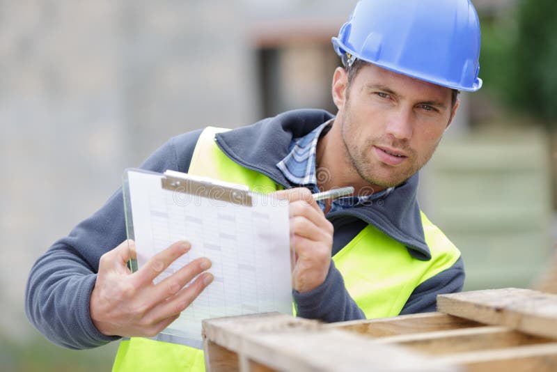 Builder Inspector Worker Writing on Clipboard Stock Photo - Image of ...