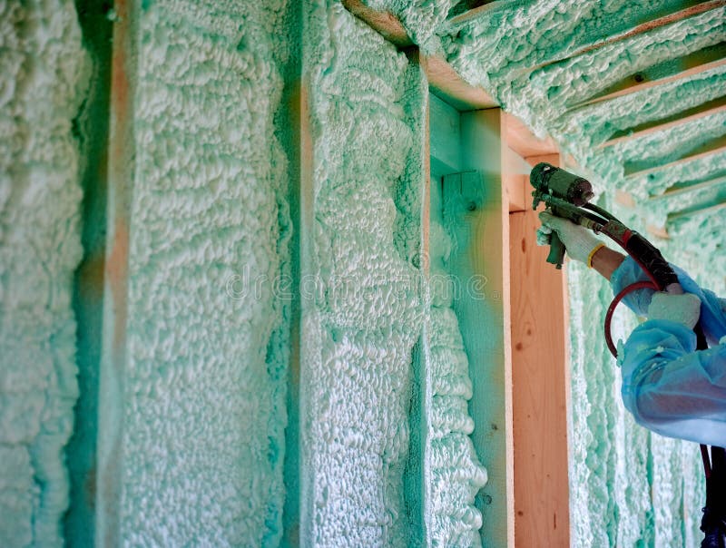 Worker Spraying Polyurethane Foam for Insulating Wooden Frame House ...