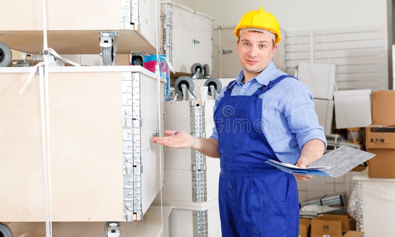 Builder Inventorying Tools and Materials Stock Photo - Image of list ...