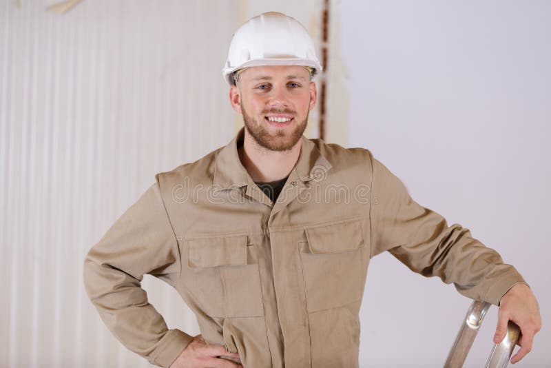 Builder on ladder stock photo. Image of climb, handyman - 197680574