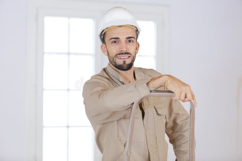 Builder on ladder stock image. Image of build, renovating - 153017415