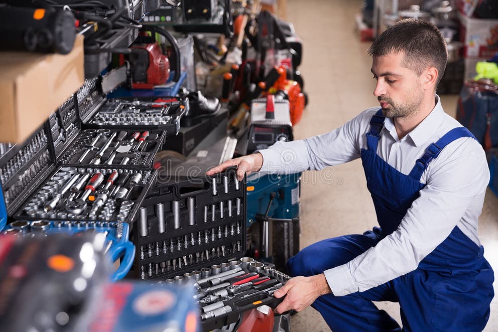Builder is Looking on Box with Tools Stock Image - Image of purchase ...