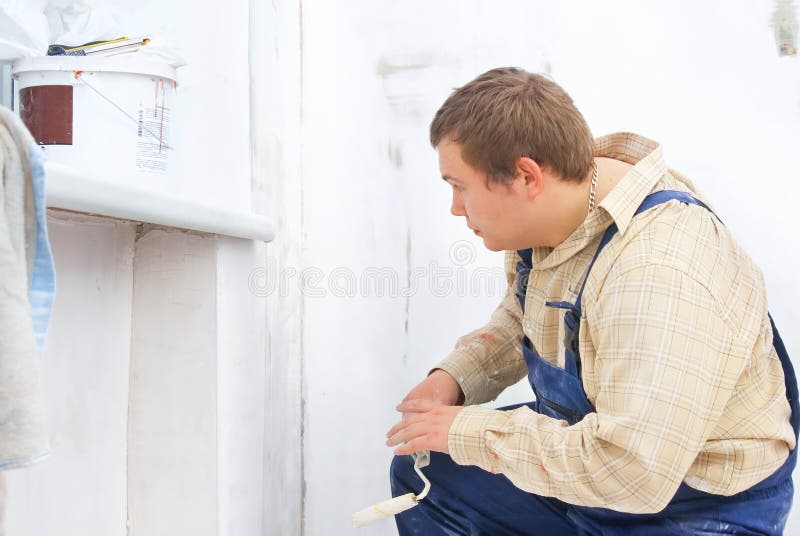 Builder Looking at the Paint Wall Stock Photo - Image of build, home ...