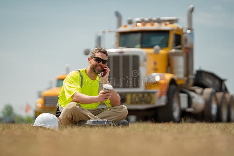 Builder with Lunch Box and Cup of Coffee Rest. Builders Break Outdoor ...
