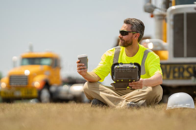 Builder with Lunch Box and Cup of Coffee Rest. Construction Man with ...