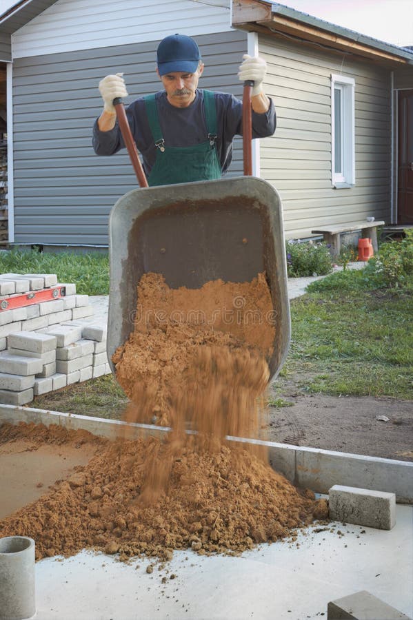 Builder Makes a Backfill for the Pavement Stock Image - Image of artist ...