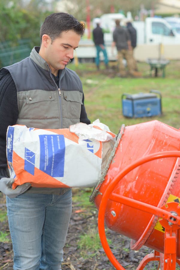 Builder Making Cement Outdoors Stock Image - Image of mixing, builder ...