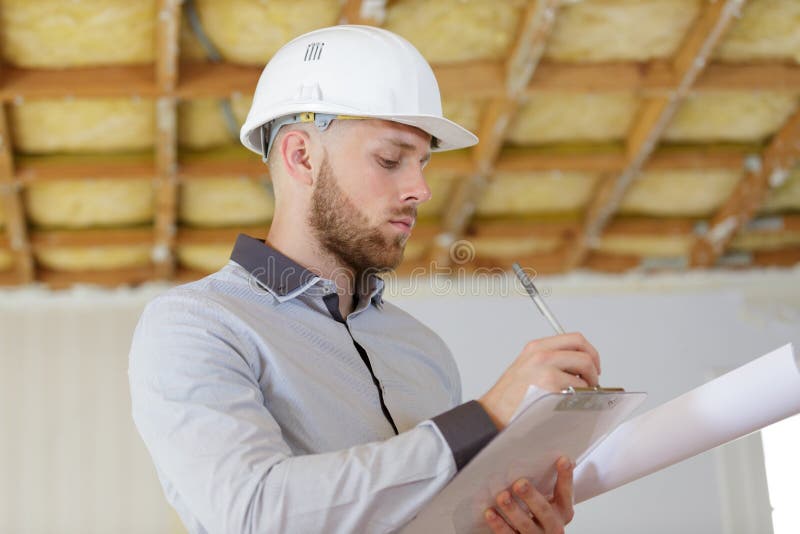 Builder Making Notes on Clipboard Stock Image - Image of inspect ...