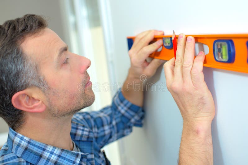 Builder Making Sure Wall Straight Stock Image - Image of masonry, line ...