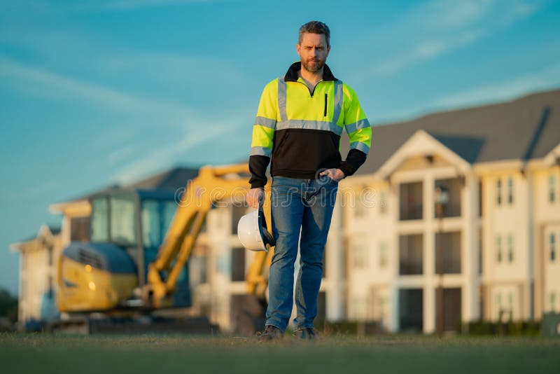Builder Man at Building Site. Construction Manager in Helmet. Male ...