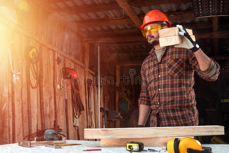 Builder Man Carries Boards on His Shoulder. Construction Work, Repair ...