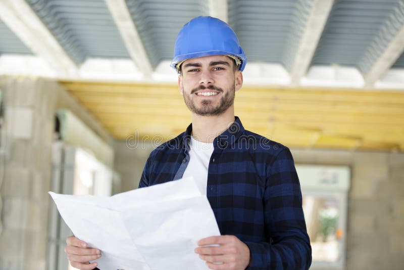 Builder Man in Helmet with Drawing Project Work Construction Designer ...
