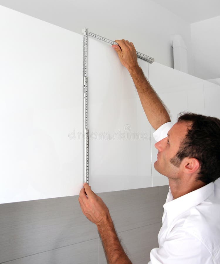 Builder Manager Measuring in the House Stock Image - Image of repair ...