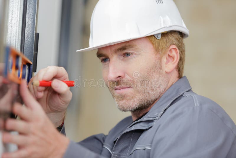 Builder Marking Spirit Level Measurement Stock Photo - Image of work ...