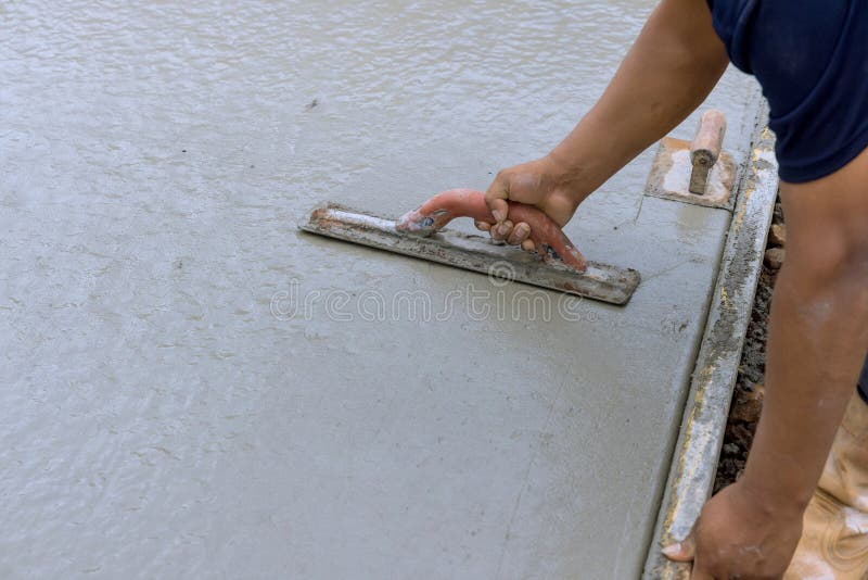 Builder Mason Worker Leveling Fresh Concrete Pavement Wet Cement Using ...