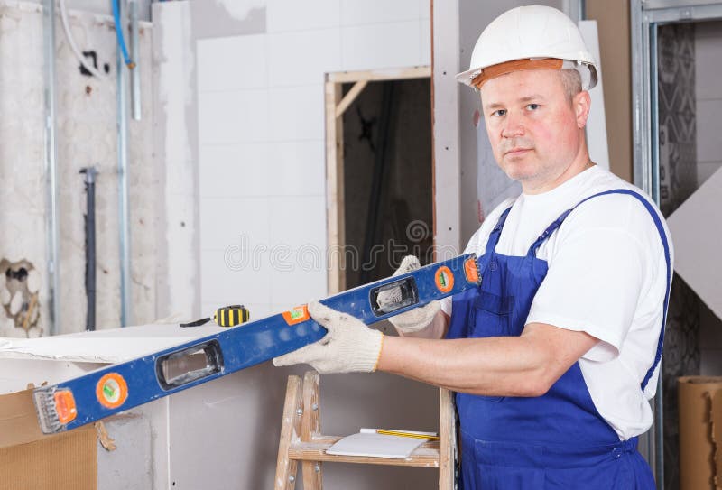 Builder Measuring Drywall Construction Stock Photo - Image of equipment ...