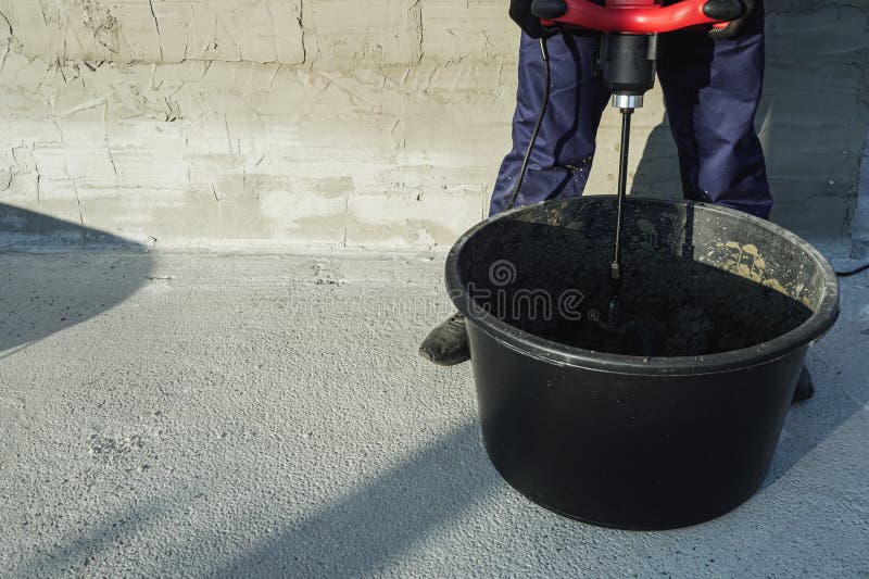 The Builder Mixes the Cement Mixture with a Mixer Stock Image - Image ...