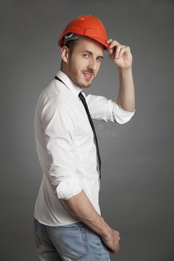 Builder in Orange Helmet. Young Smiling Successful Engineer Stock Image ...