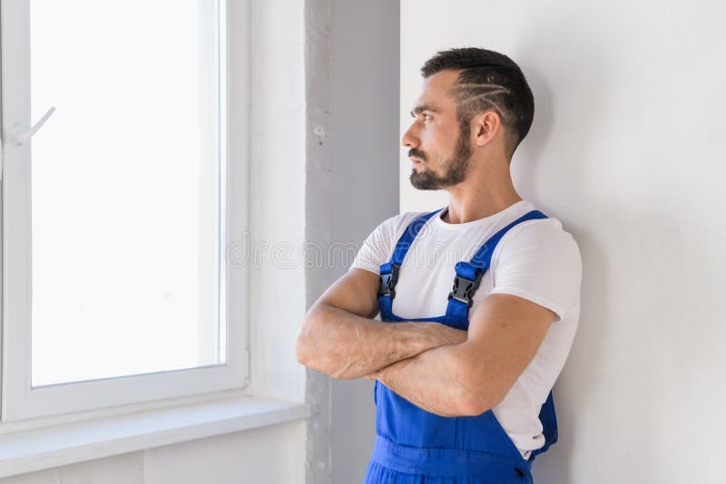 Builder in Overalls Folded His Arms Over His Chest Stock Image - Image ...