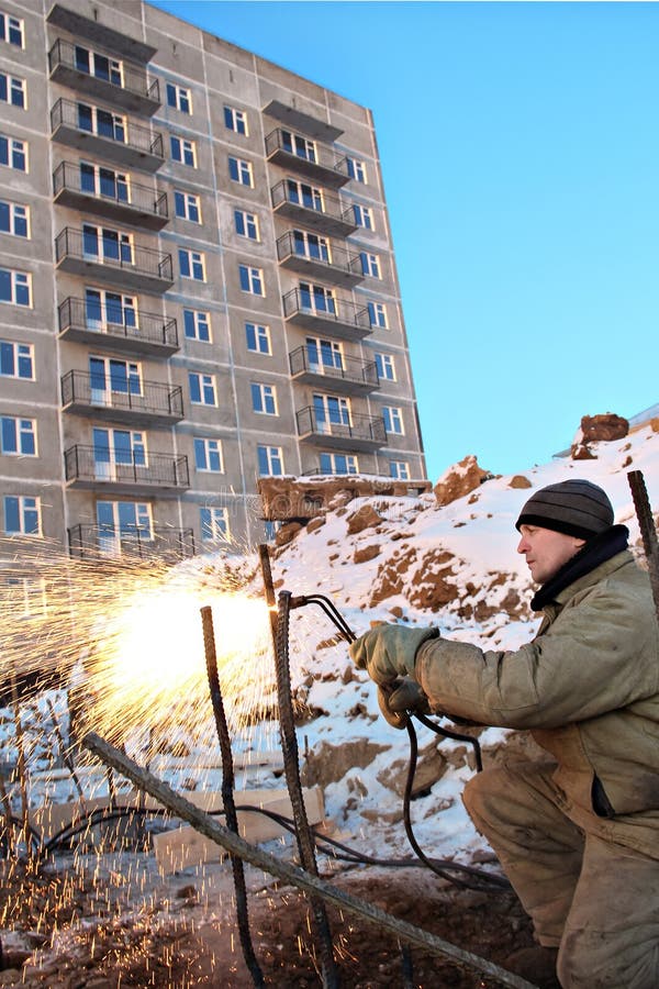 Builder Performs Welding Work at the Construction Site Stock Image ...