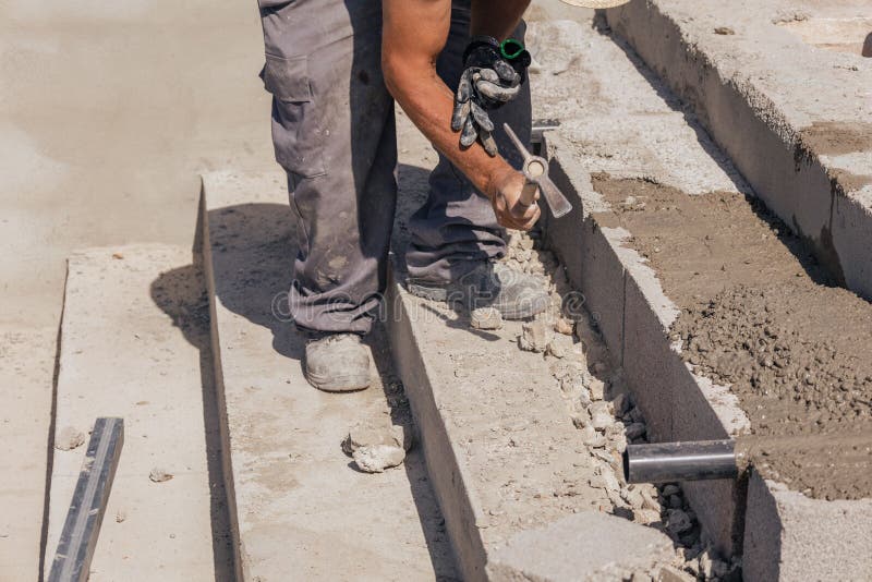 Builder in the Process of Making a Stairs on a Sunny Day Stock Image ...