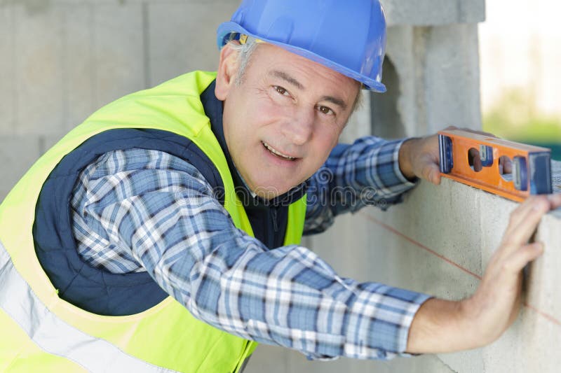 Builder with Professional Level Stock Photo - Image of home ...