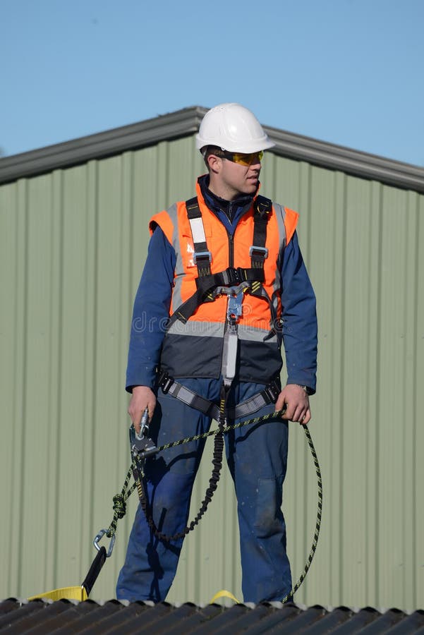 Builders on top stock photo. Image of above, helmet, beam - 48608324