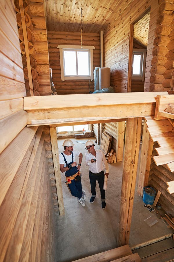 Builder is Receiving Instructions from Construction Engineer Stock ...