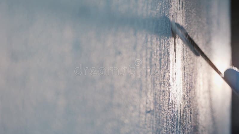 Builder S Hand with Putty Knife, Putty on a White Wall Stock Footage ...