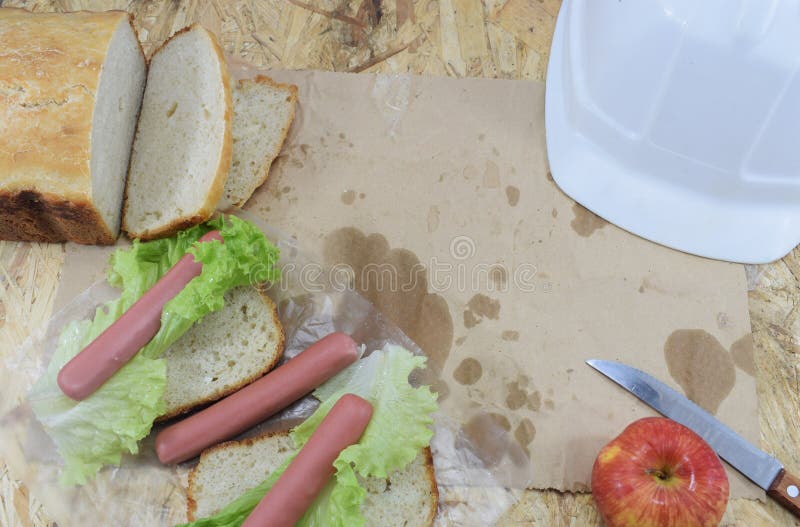 A Builder`s Lunch, a Wooden Work Table on the Construction Site with ...