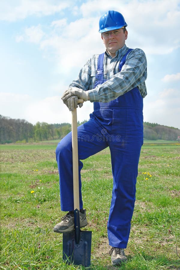 Farmer Standing with Shovel Stock Image - Image of senior, baby: 1464033