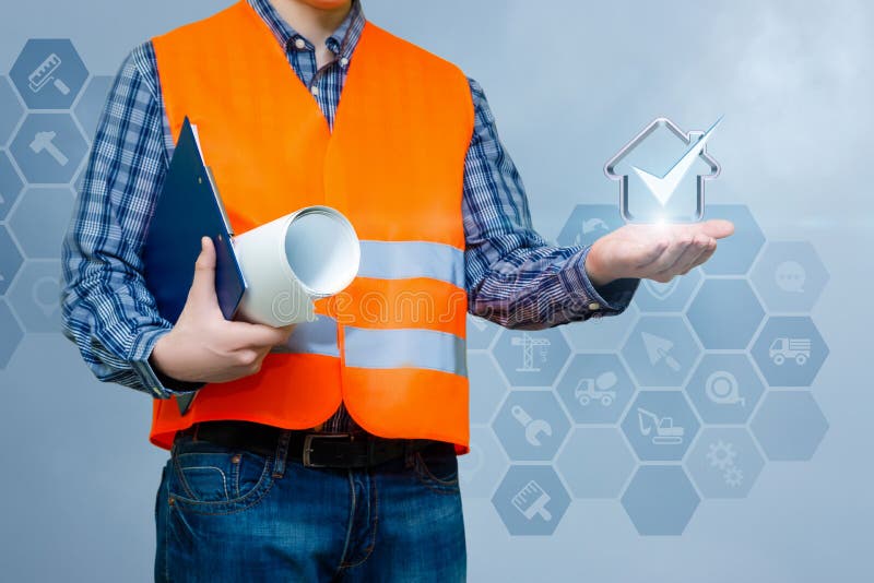 Builder Shows in the Hands of the House with a Tick. Stock Photo ...