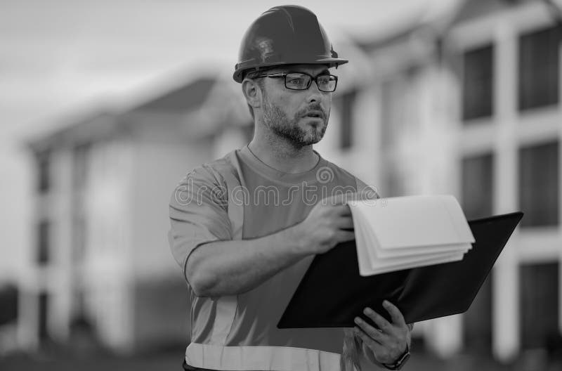 Builder on Site Construction. Man Worker in Hard Hat Stock Photo ...