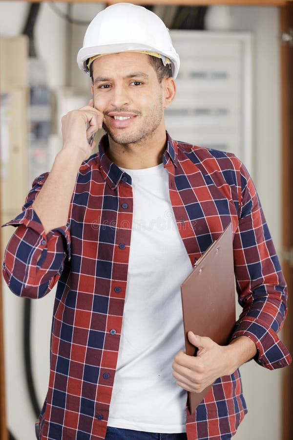Builder on mobile phone stock image. Image of working - 21649259