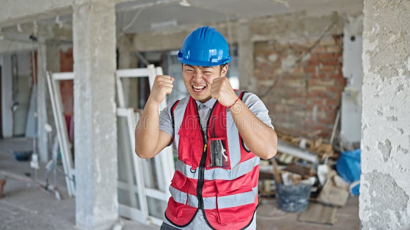 Builder Smiling Confident Standing at Construction Site Stock Image ...