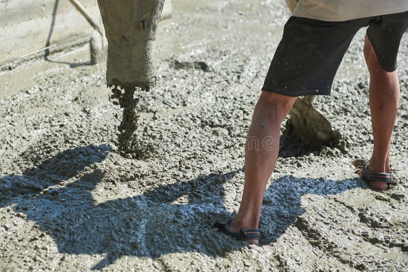 Builder Standing in a Concrete Mortar, Heavy Construction Work Stock ...