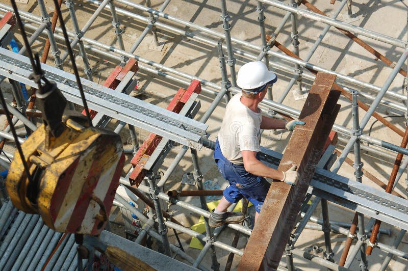 Builder with steel beam stock image. Image of steel, helmet - 2122437