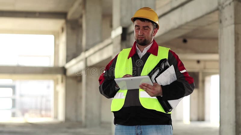 Builder with Tablet Computer on Construction Site Stock Video - Video ...