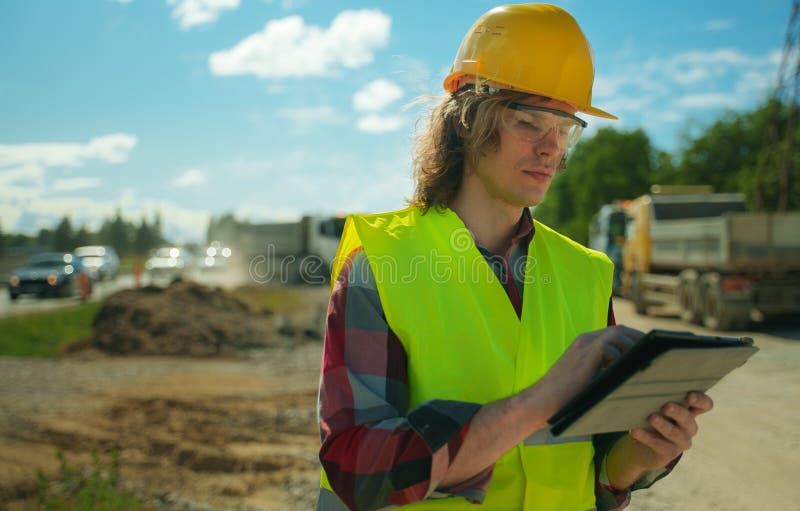 Builder with tablet pc stock photo. Image of connection - 221996452