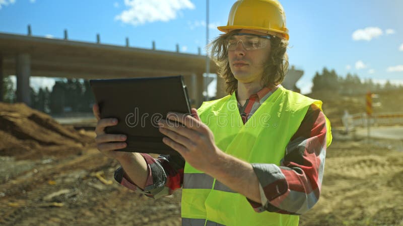 Builder with tablet pc stock photo. Image of contractor - 222761682