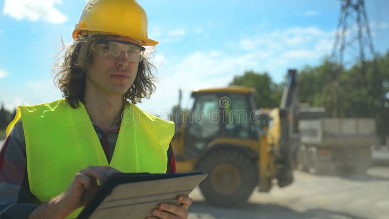 Builder with tablet pc stock image. Image of junction - 222761715