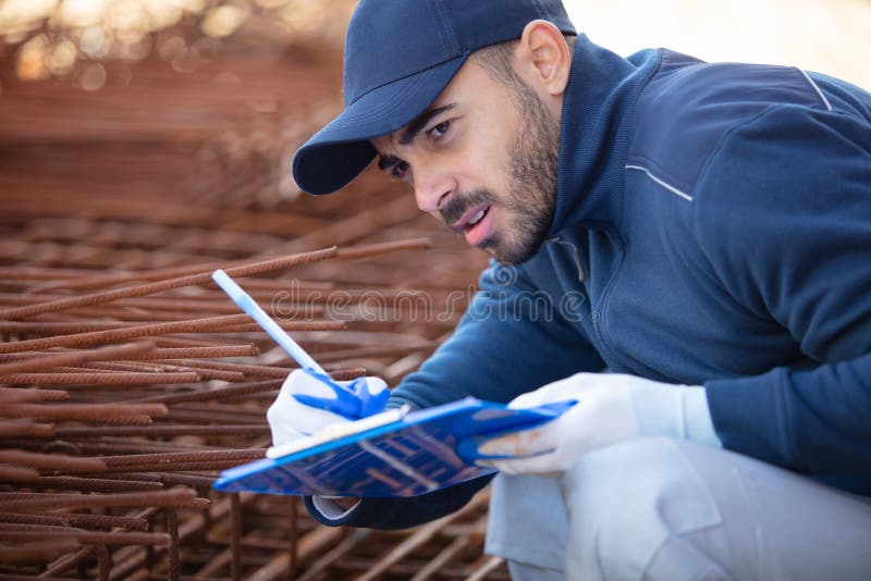 Builder Taking Notes at Construction Site Stock Image - Image of subway ...