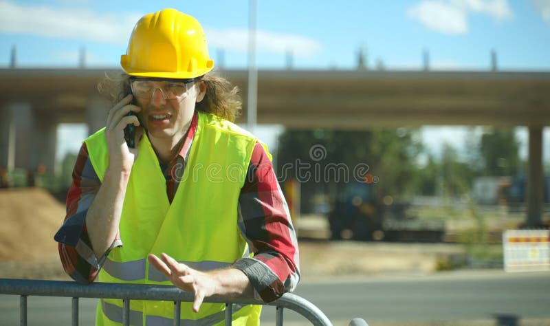 Builder Talking by Smartphone Stock Photo - Image of building, junction ...