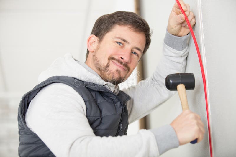 Builder Tapping Beading into Join in Wall Stock Image - Image of ...