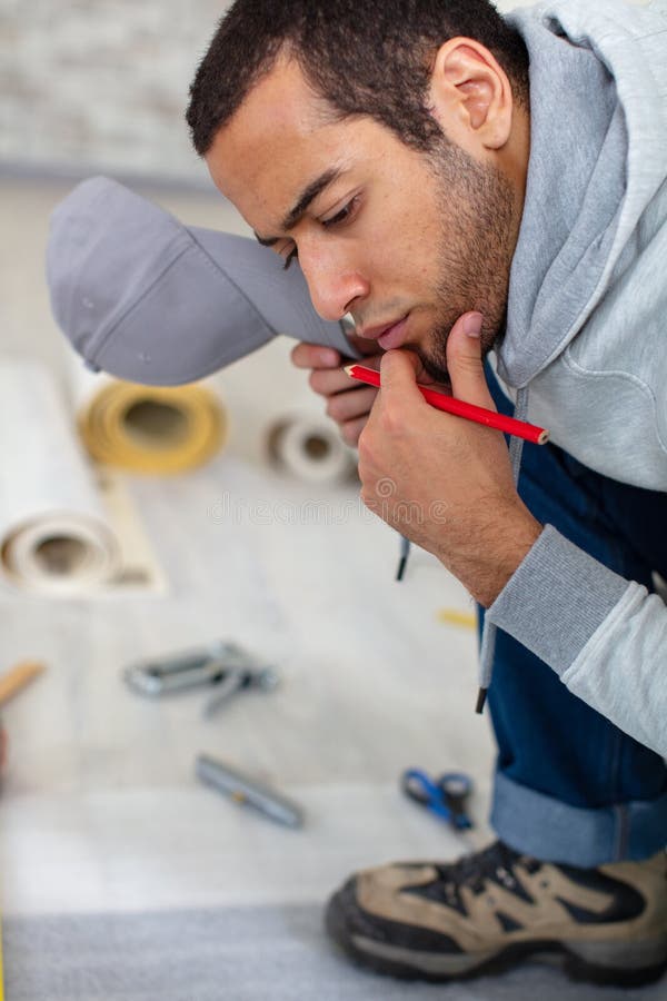 Builder Thinking in Work Clothes Stock Photo - Image of person ...