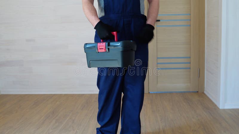 Builder with Tools in a New Wooden Prefabricated House. Modular House ...