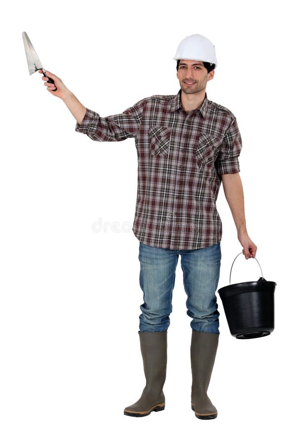 Builder with a trowel stock photo. Image of accessories - 35392366